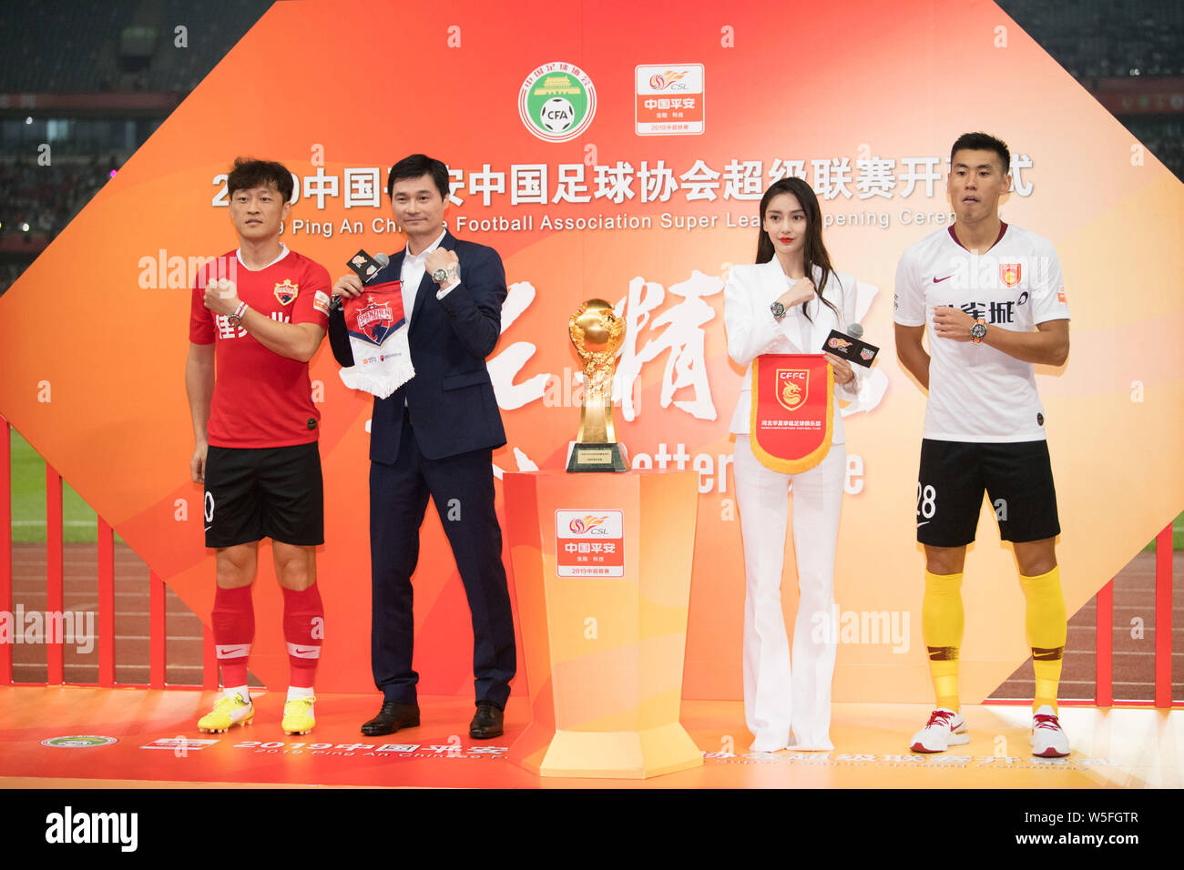 Hong Kong actress Angelababy, second right, attends the opening ...