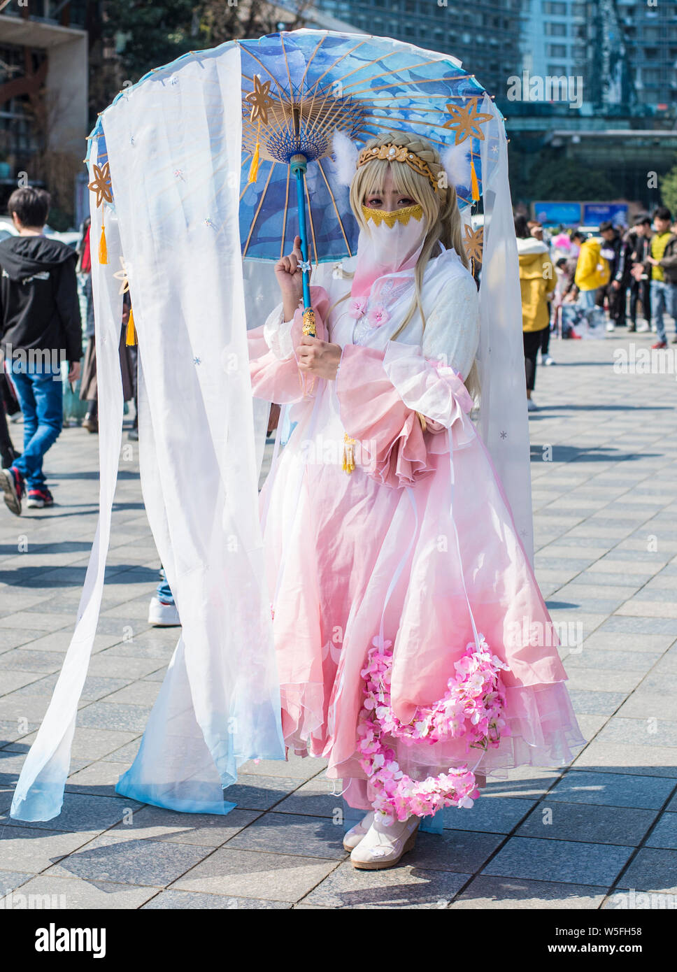 A Chinese coser dressed in cosplay costumes poses during the 23rd ...