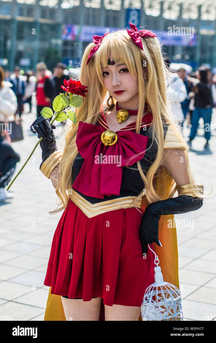 A Chinese coser dressed in cosplay costumes poses during the 23rd ...