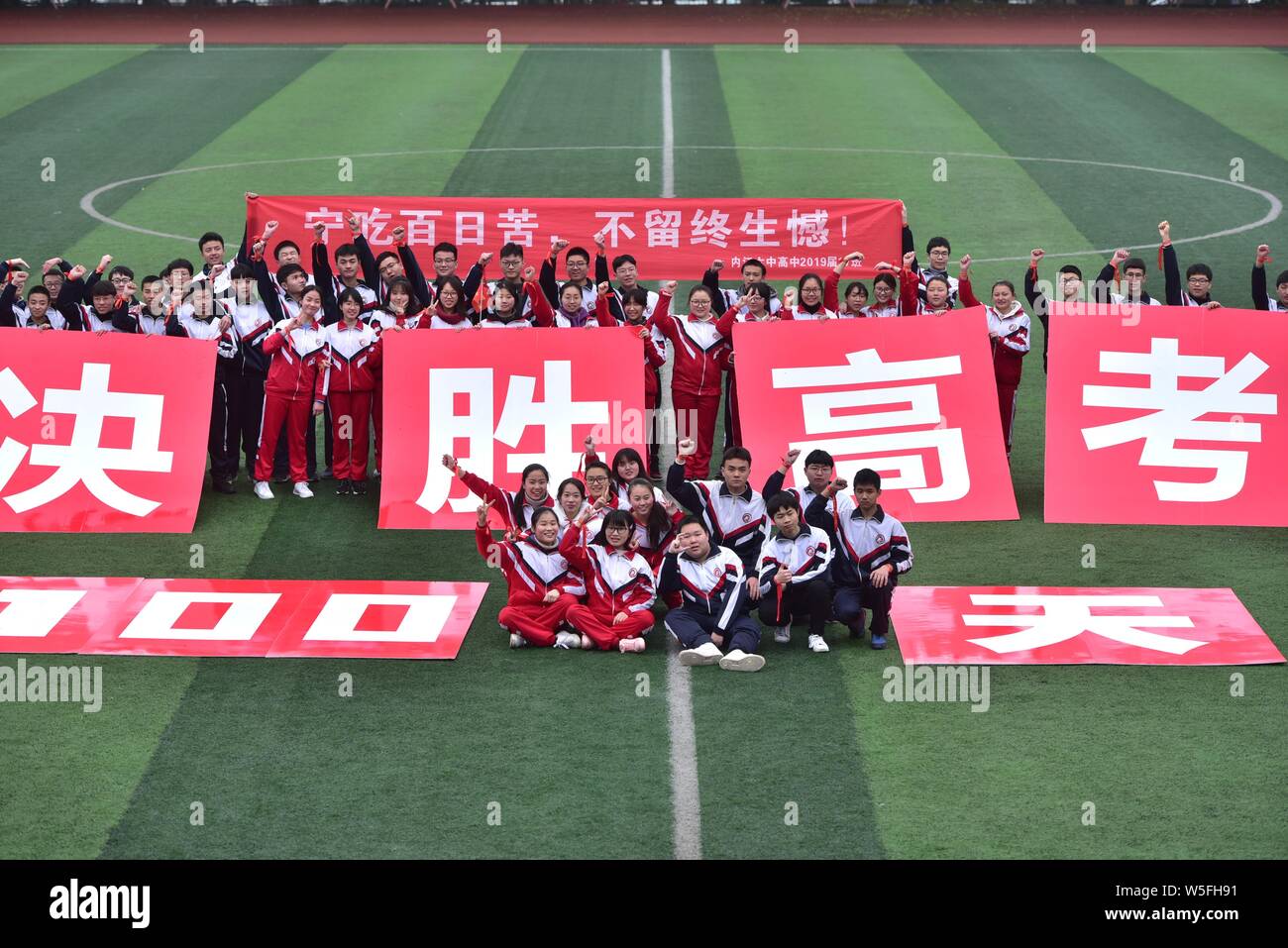 Chinese students queue up in lines during a mass rally for the upcoming ...