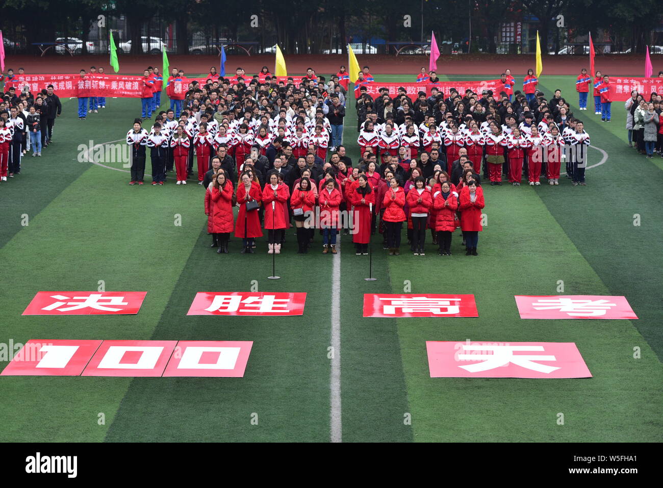 Chinese students queue up in lines during a mass rally for the upcoming ...
