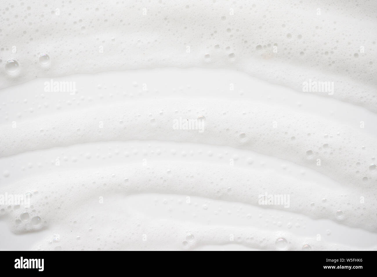 Abstract background white soapy foam texture. Shampoo foam with bubbles ...