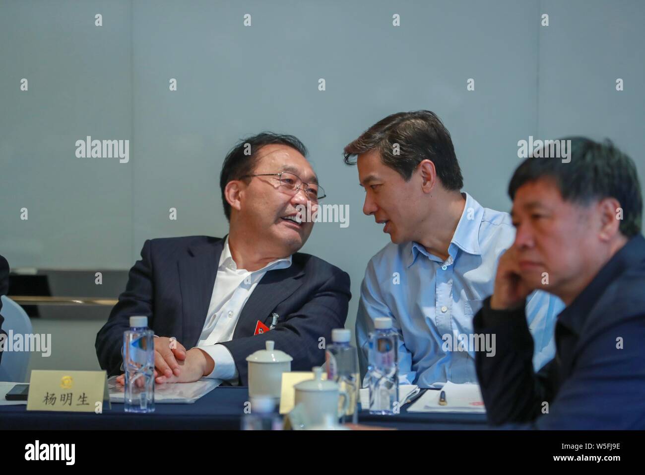 Robin Li Yanhong, right, Chairman and CEO of Baidu and member of the ...