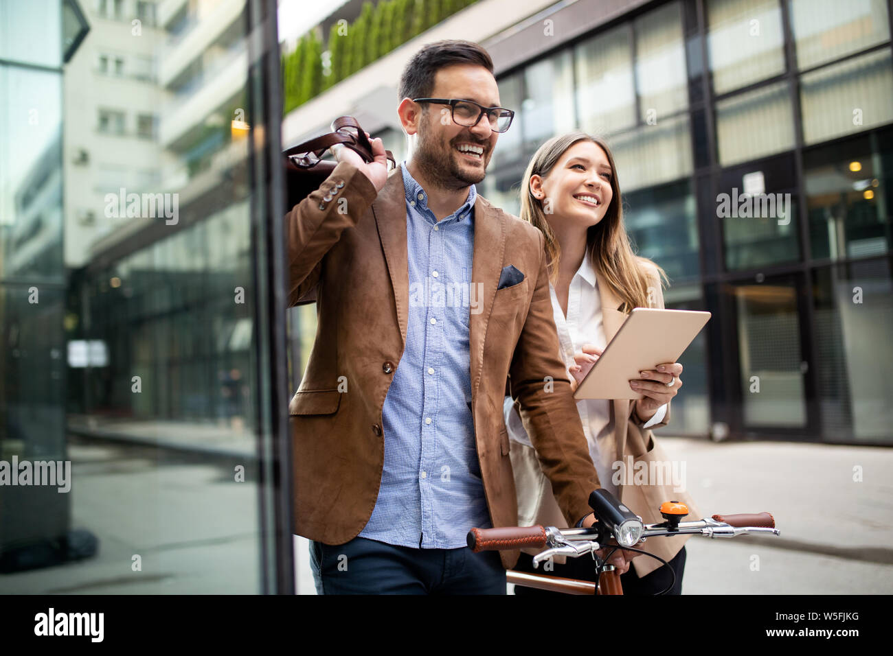 Office woman with business man couple enjoying break while talking ...