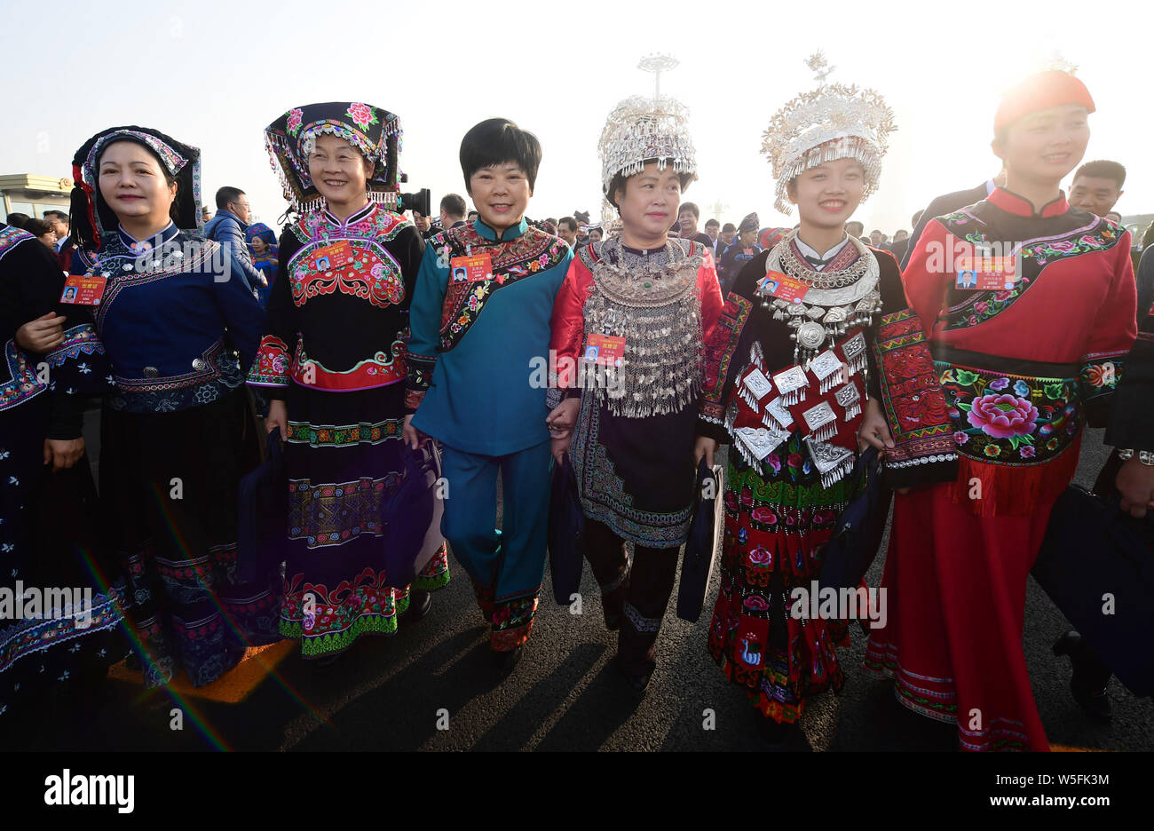 Chinese ethnic minorities deputies wearing traditional costumes and ...