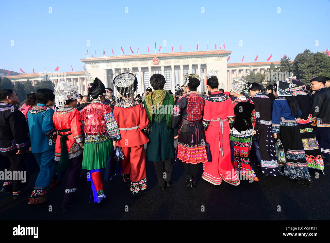 Chinese ethnic minorities deputies wearing traditional costumes and ...