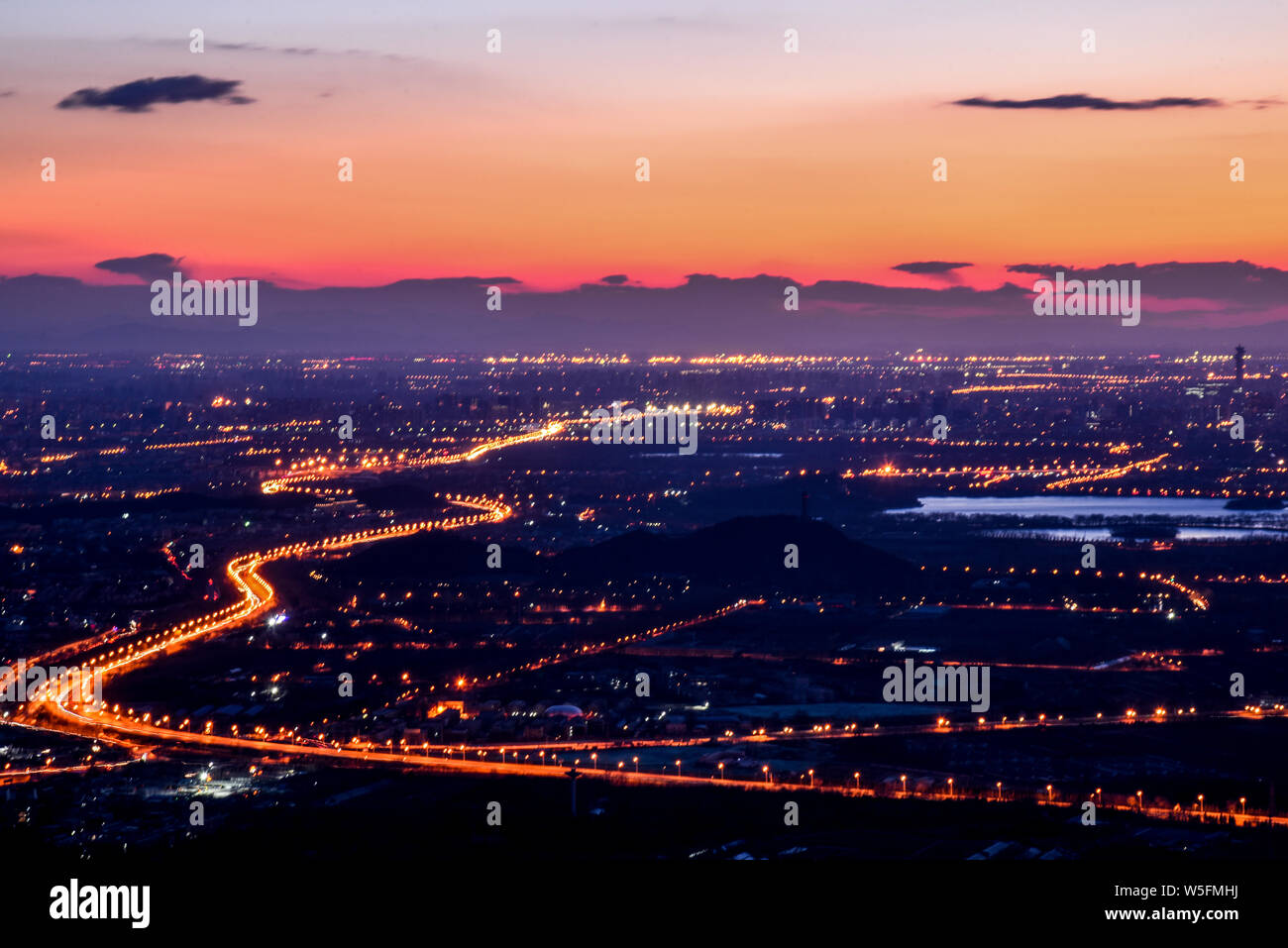 Skyline of the high-rising buildings and skyscrapers at sunrise in ...