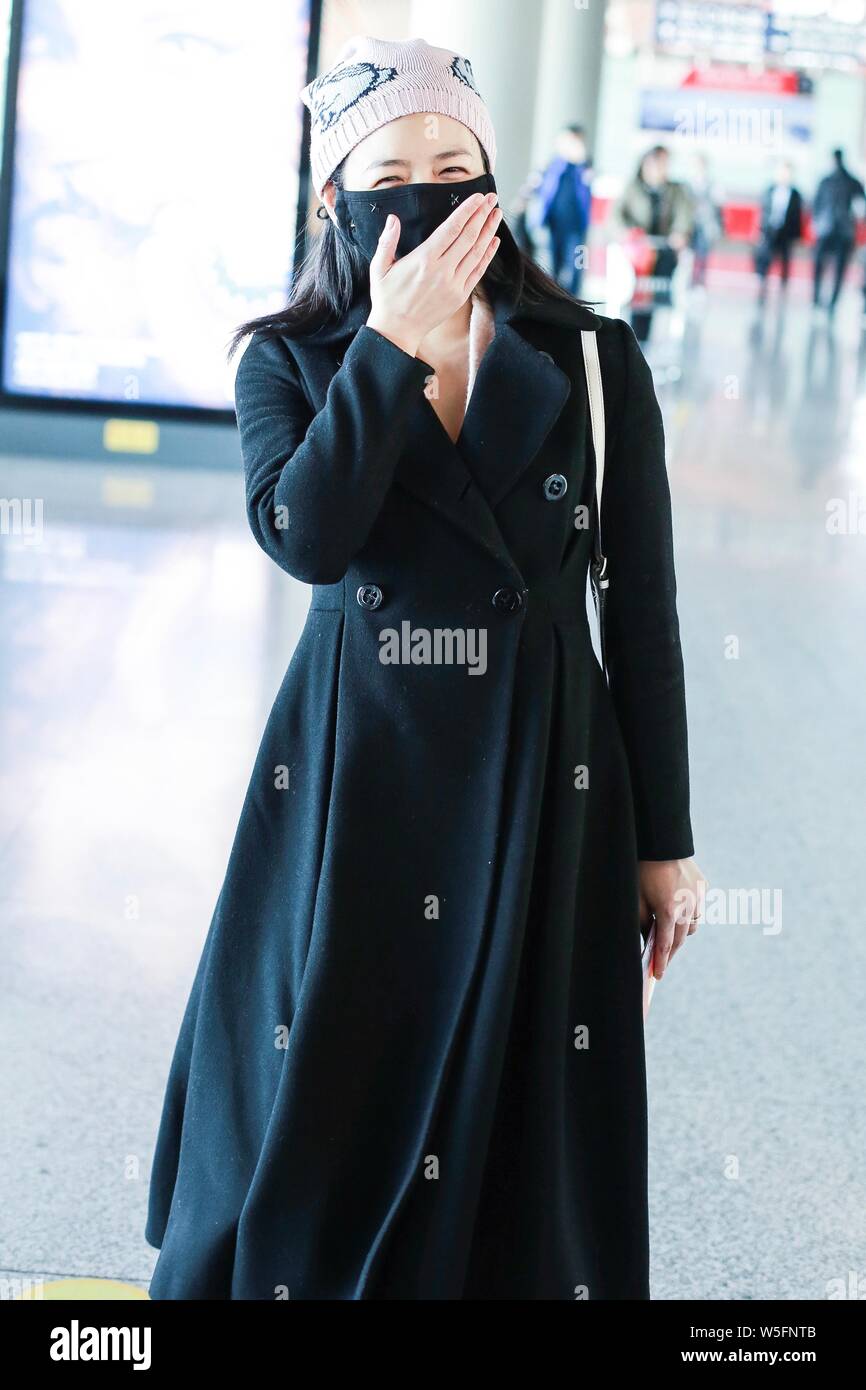 Taiwanese actress Michelle Chen wearing a face mask arrives at the ...