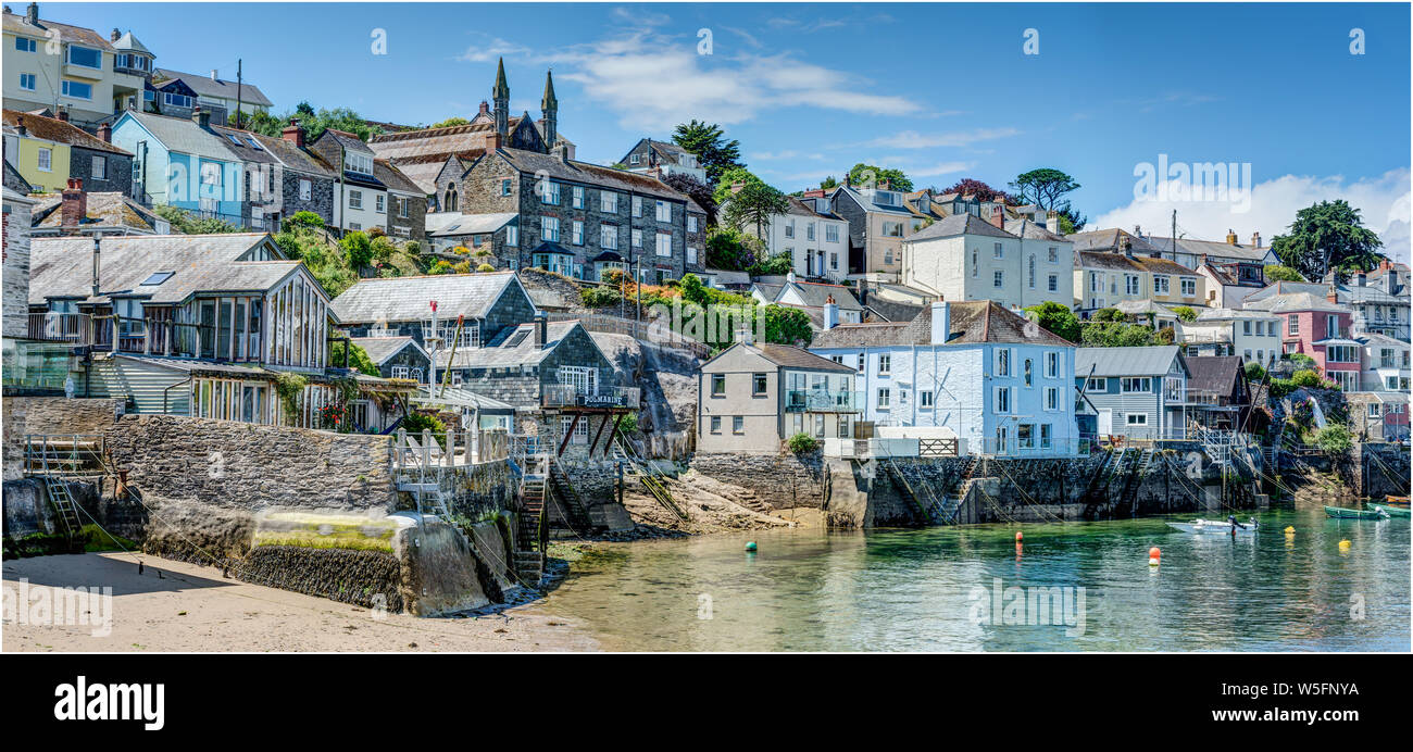 A panoramic landscape of Polruan harbour, a typical Cornish seaside ...