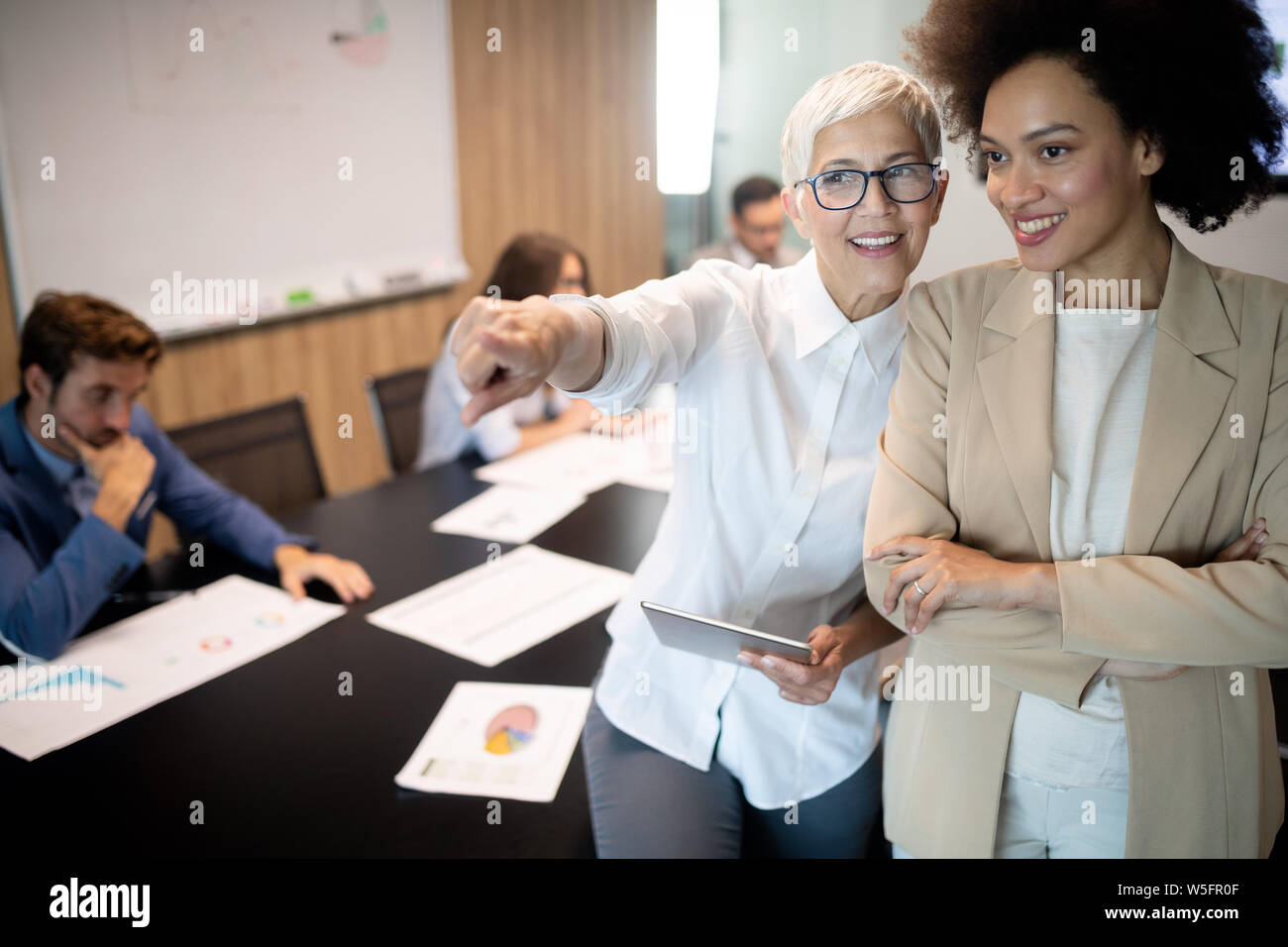 Successful business group of people at work in office Stock Photo - Alamy