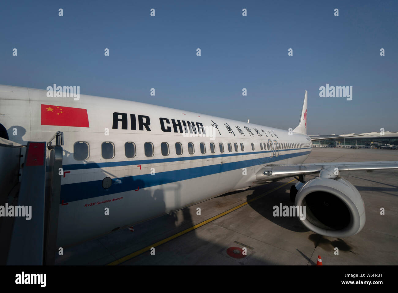 --FILE--A jet plane of Air China is parked at the Beijing Capital ...