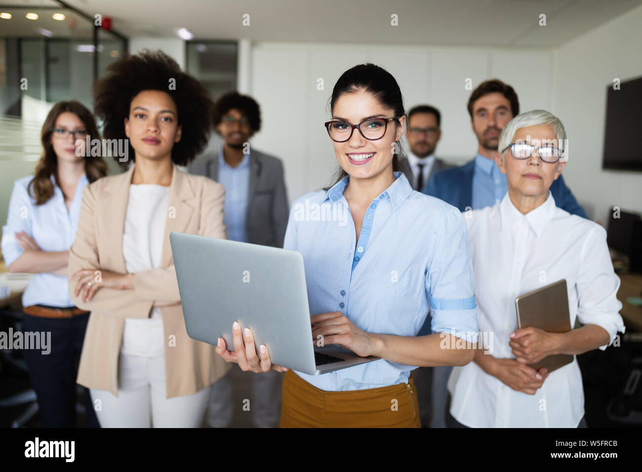 Programmer working in a software developing company office. Staff ...