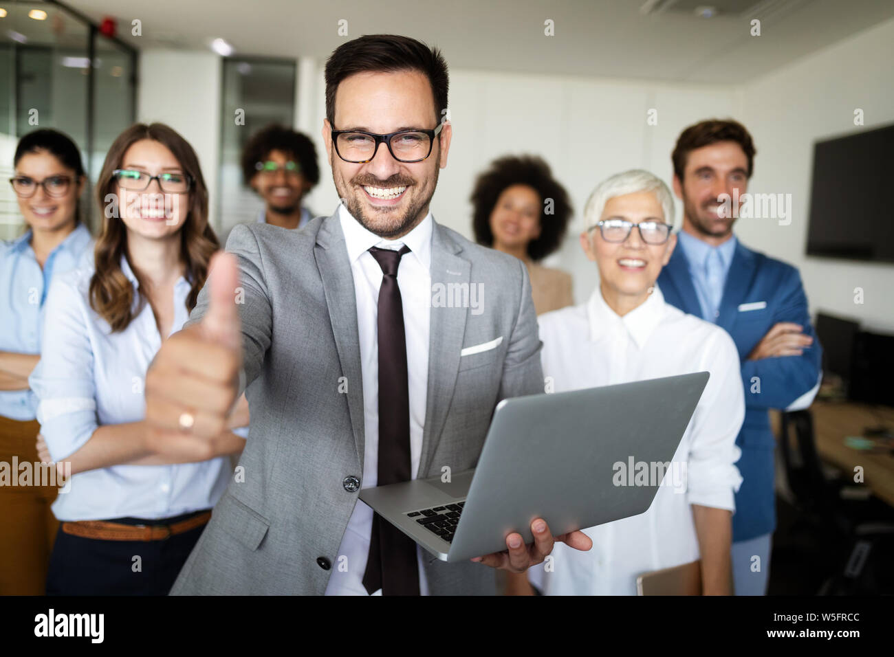 Happy workers hi-res stock photography and images - Alamy