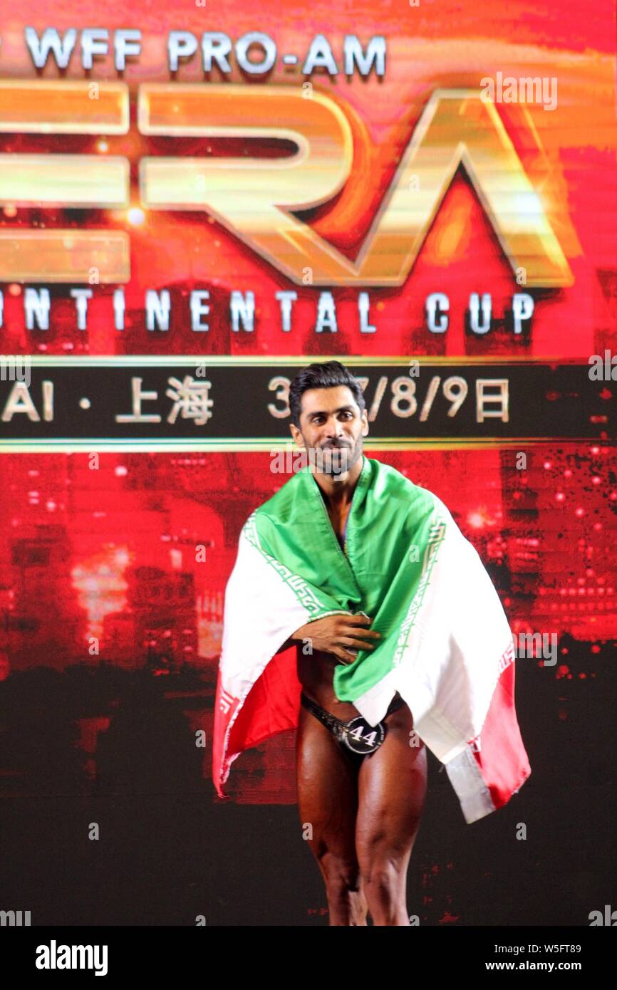 An Iranian bodybuilder poses after winning during the Tera Cup "NABBA ...
