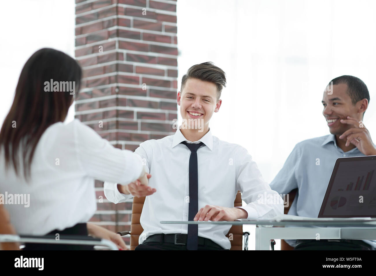 Welcoming customer hi-res stock photography and images - Alamy