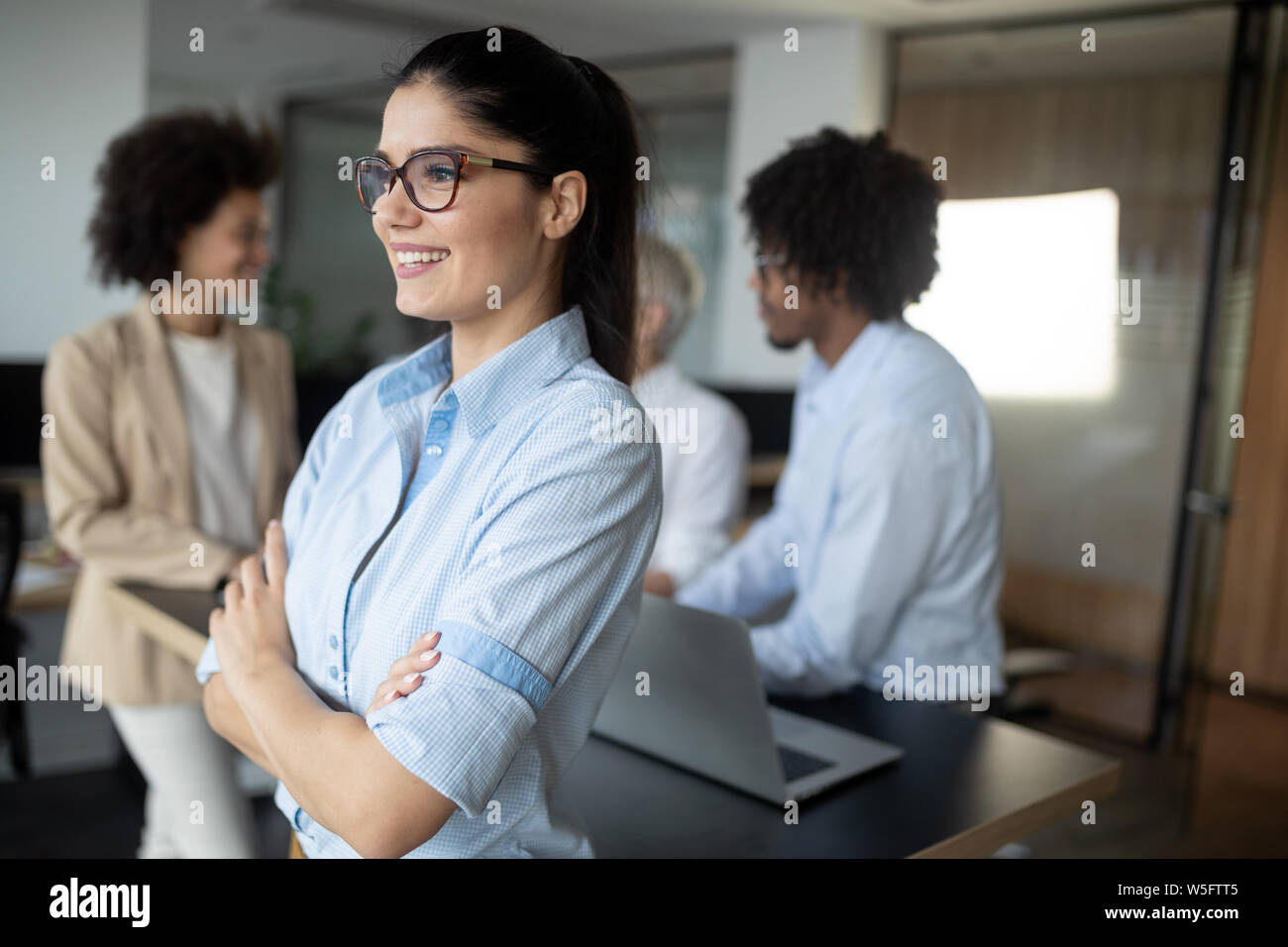 Group of successful business people at work in office Stock Photo - Alamy