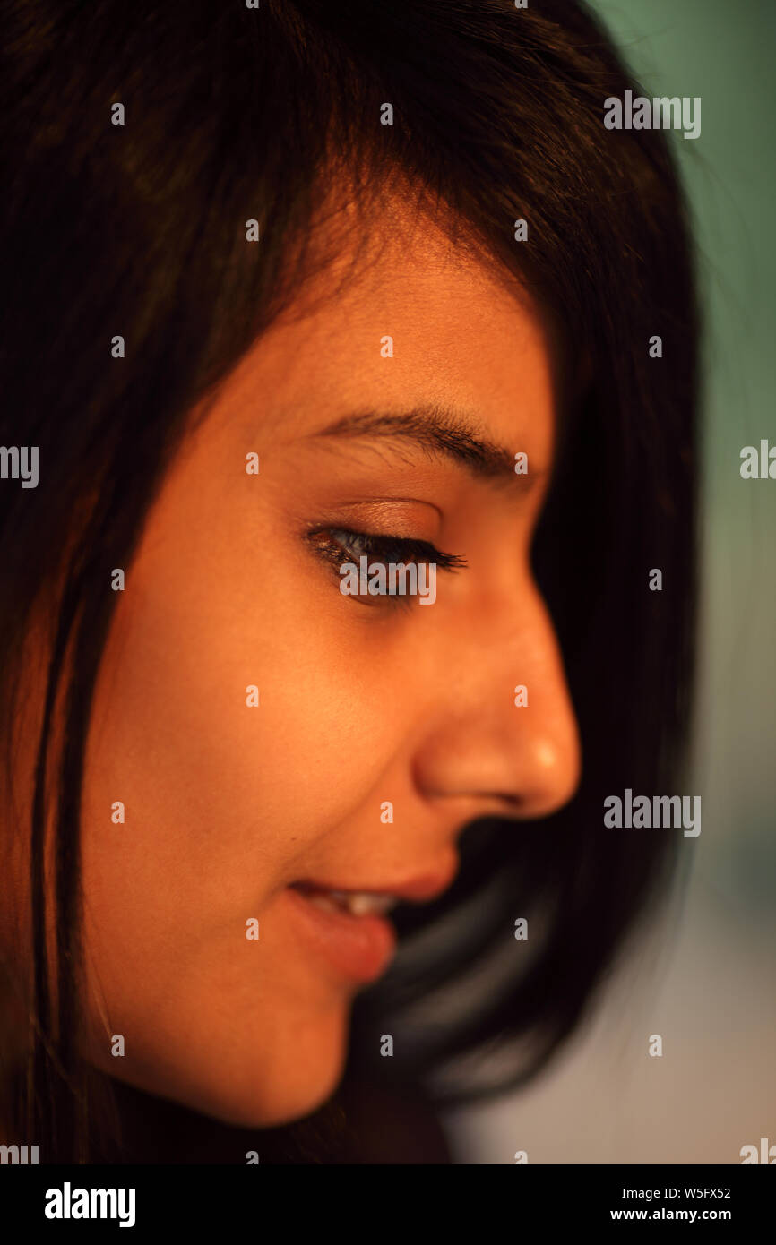 Side profile of a woman Stock Photo - Alamy