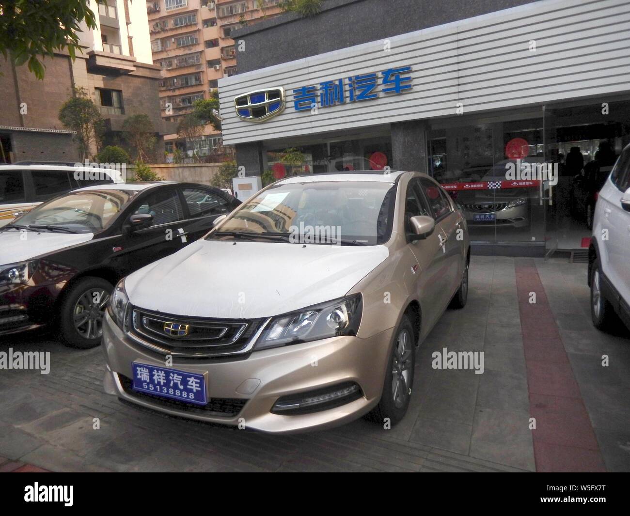 --FILE--View of a dealership store of Geely in Yunyang county ...