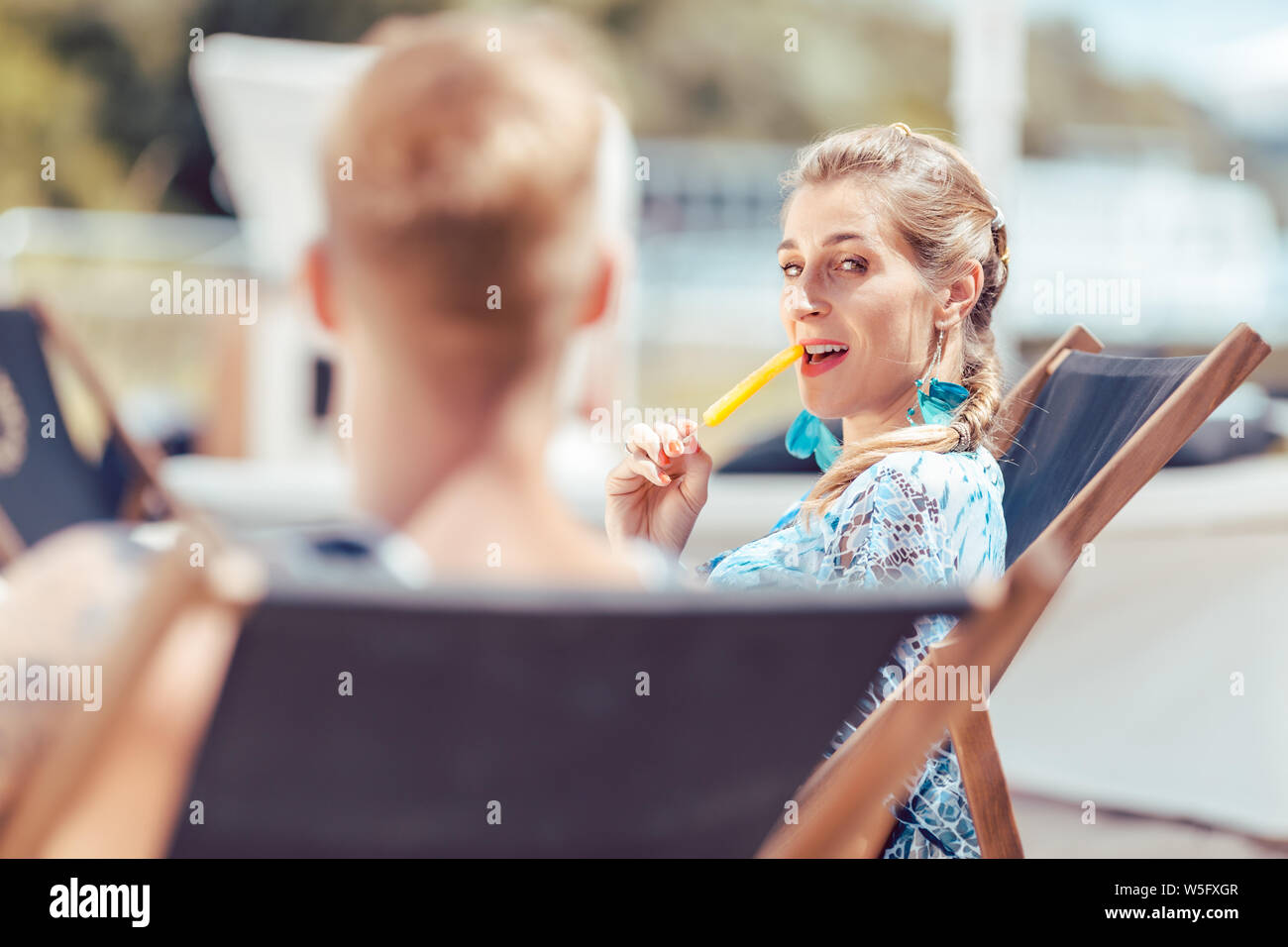 Eating popsicle adult hi-res stock photography and images - Alamy