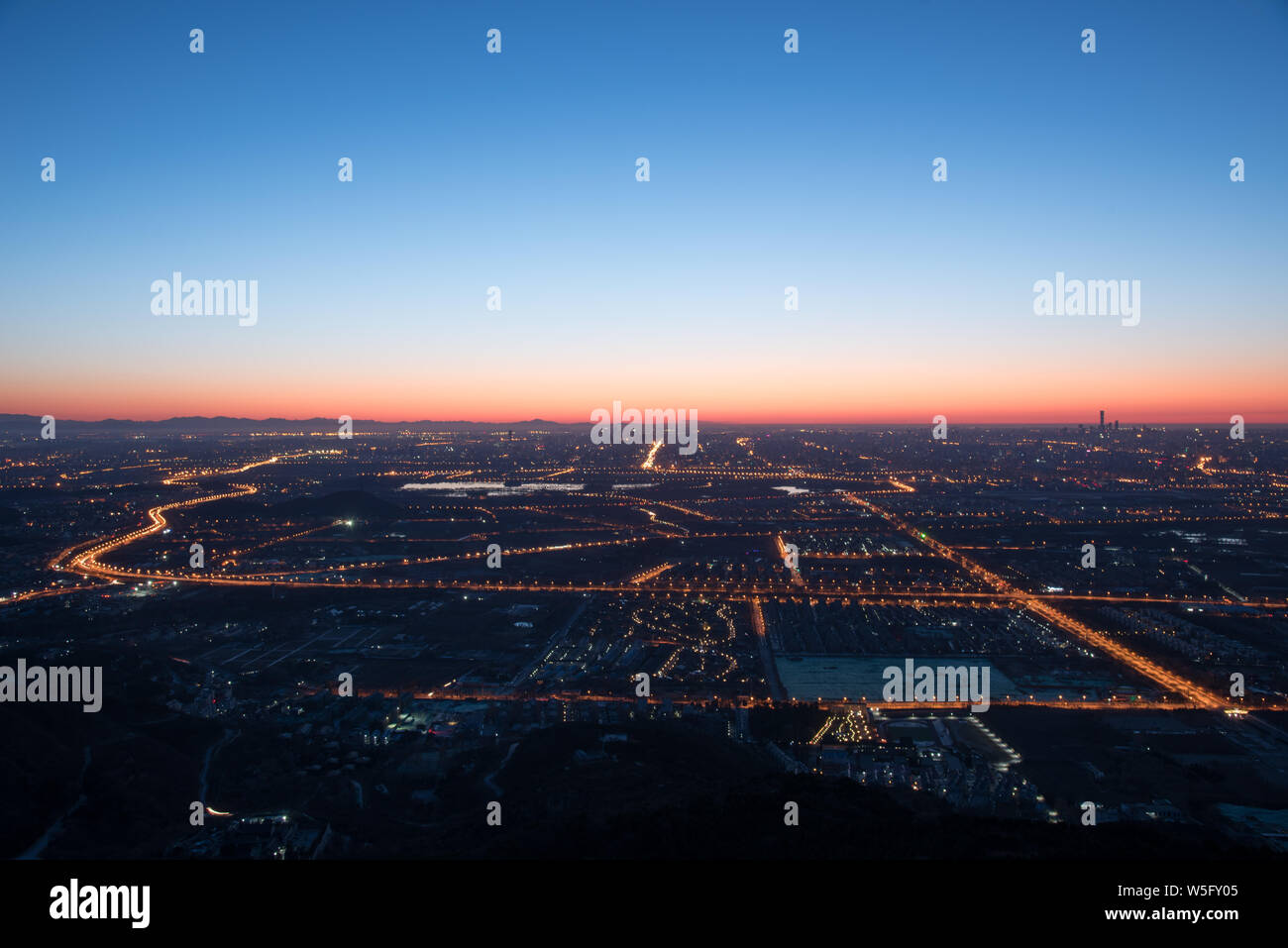 Skyline of the high-rising buildings and skyscrapers at sunrise in ...