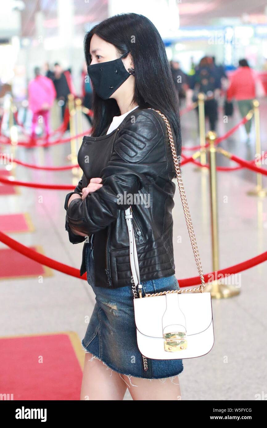 Taiwanese actress Michelle Chen wearing a face mask arrives at the ...
