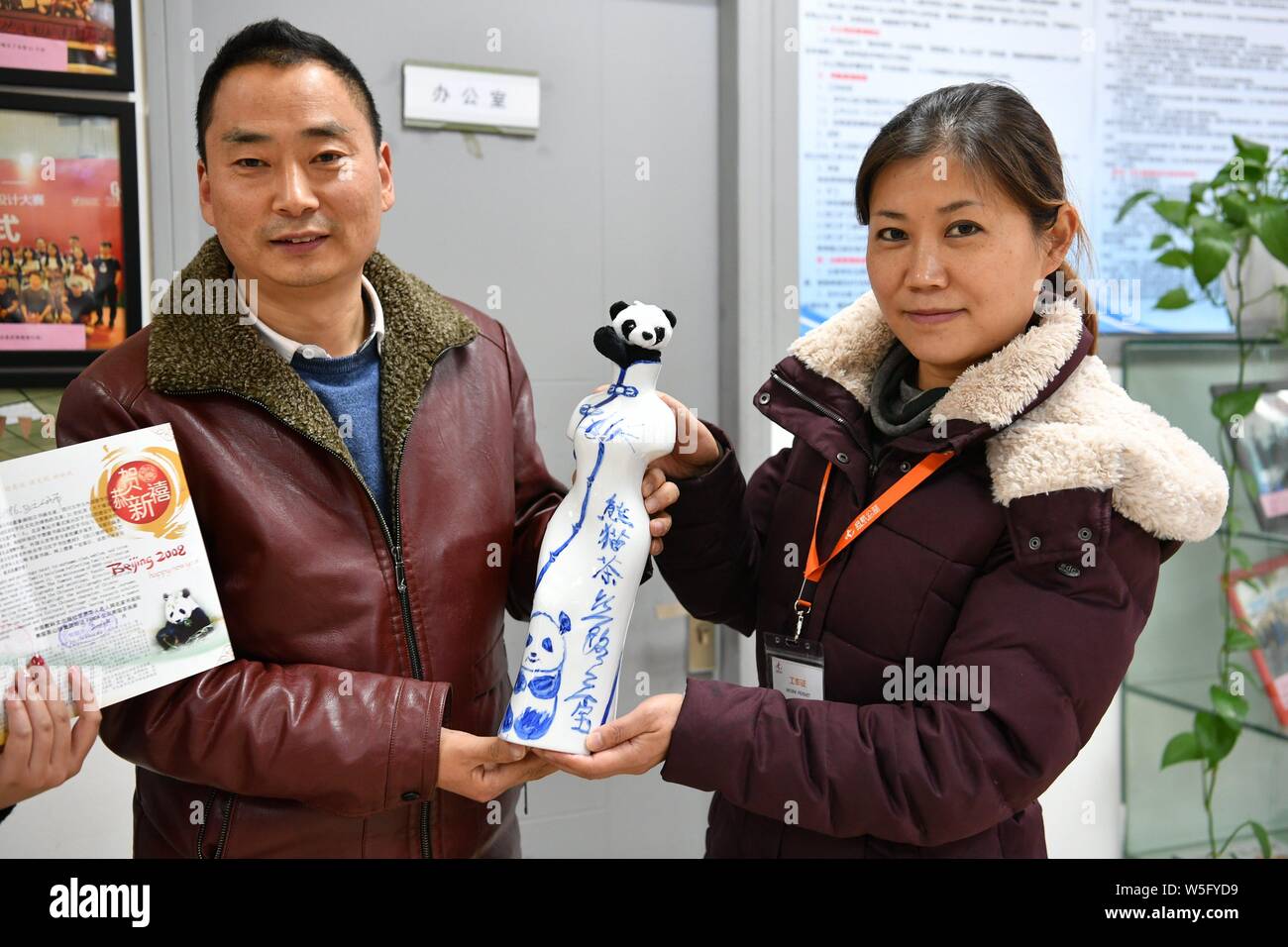 An Yanshi, left, founder of the world's most expensive tea, panda poo ...