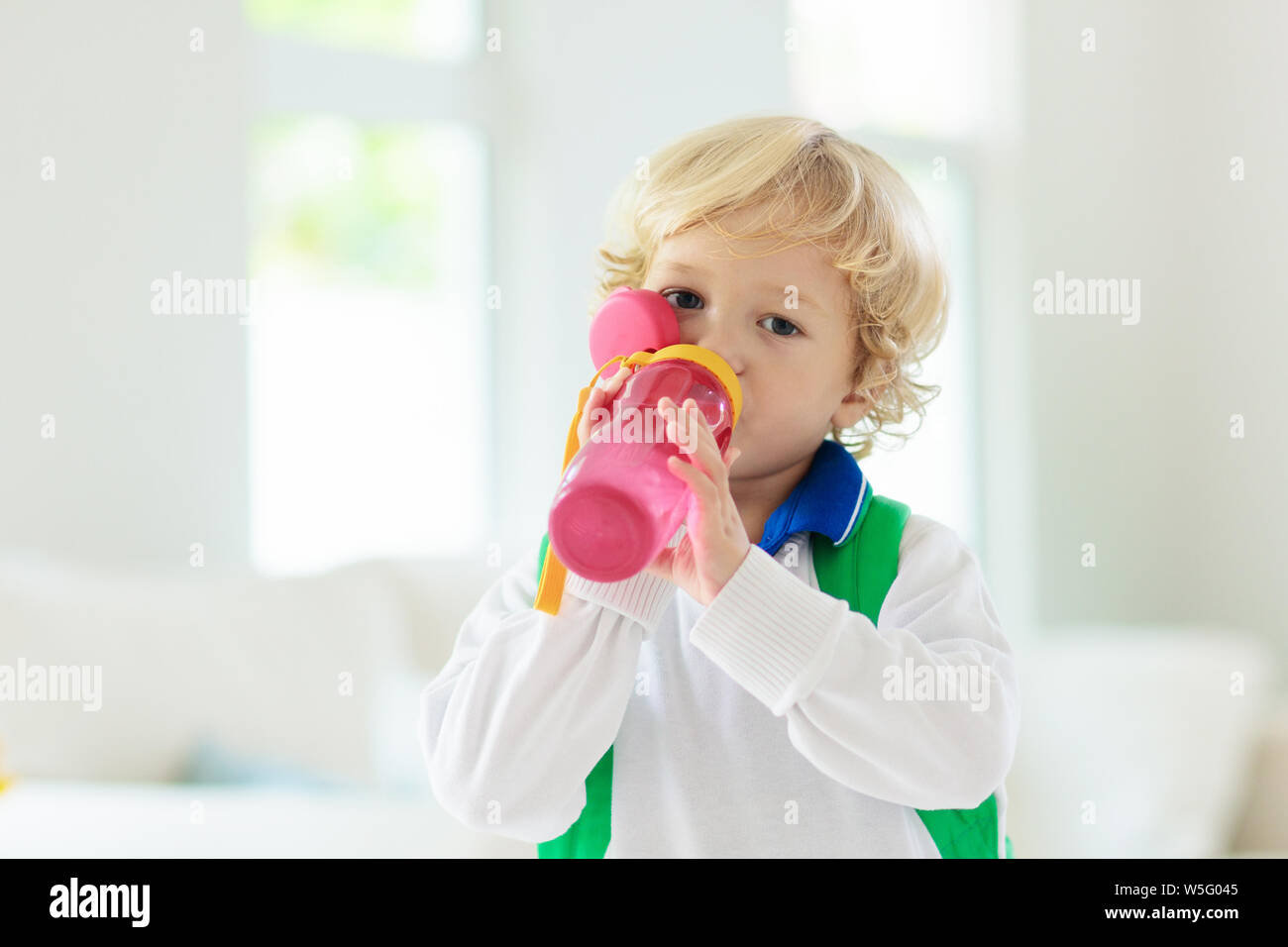 Child going back to school. Kid getting ready for first school day ...