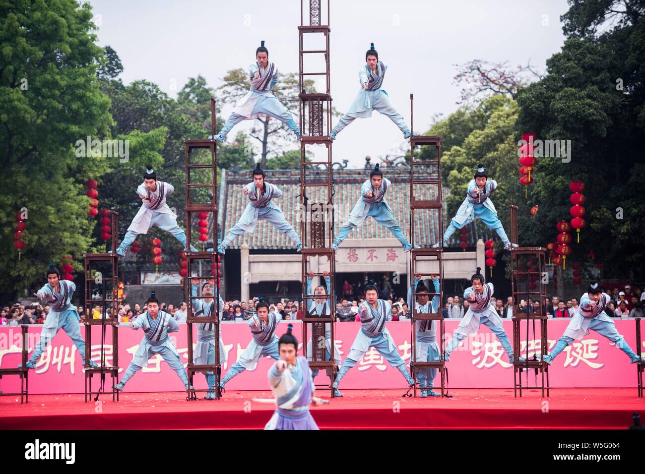 People attend the opening ceremony of the Boluo Dan Temple Fair ...