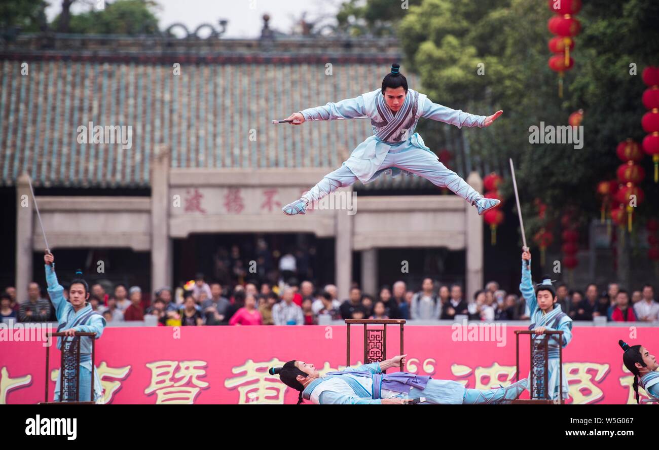 People attend the opening ceremony of the Boluo Dan Temple Fair ...