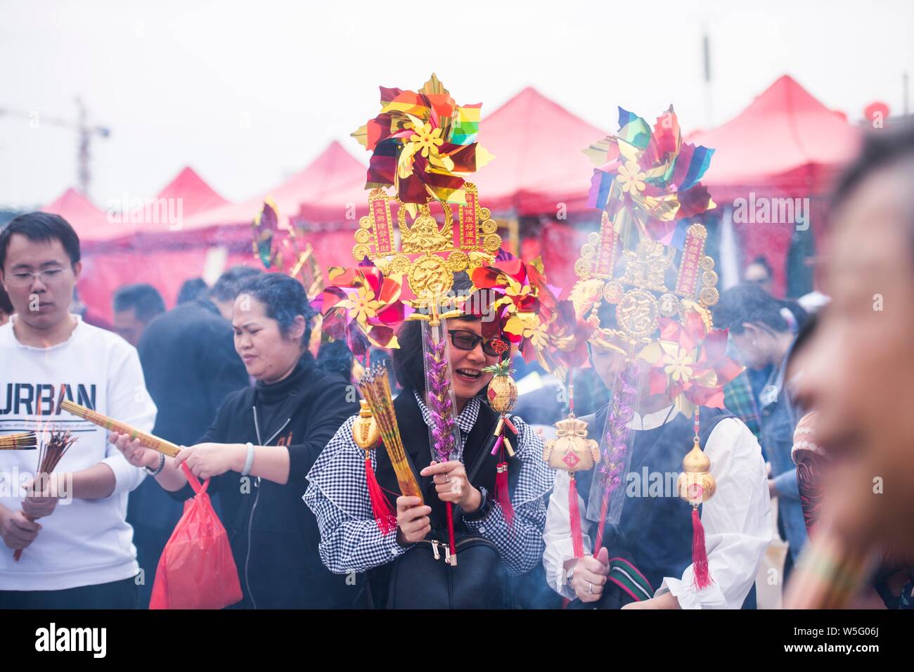 People attend the opening ceremony of the Boluo Dan Temple Fair ...