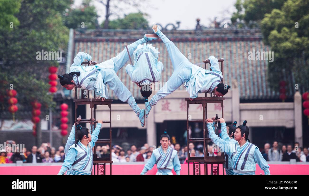 People attend the opening ceremony of the Boluo Dan Temple Fair ...