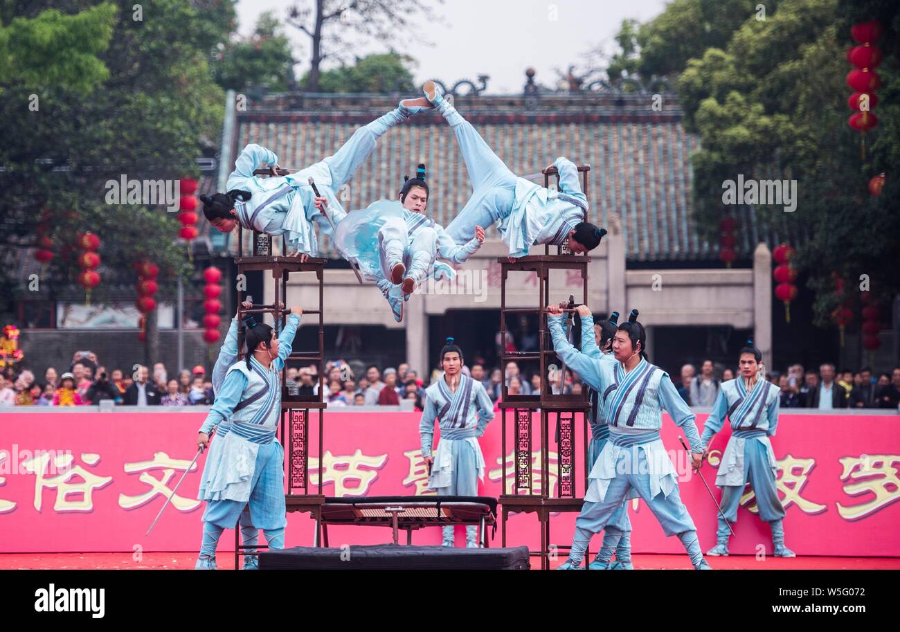 People attend the opening ceremony of the Boluo Dan Temple Fair ...
