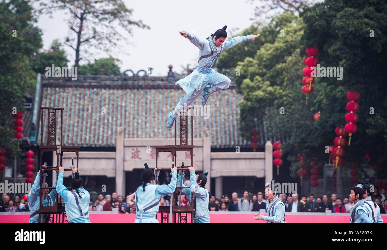 People attend the opening ceremony of the Boluo Dan Temple Fair ...