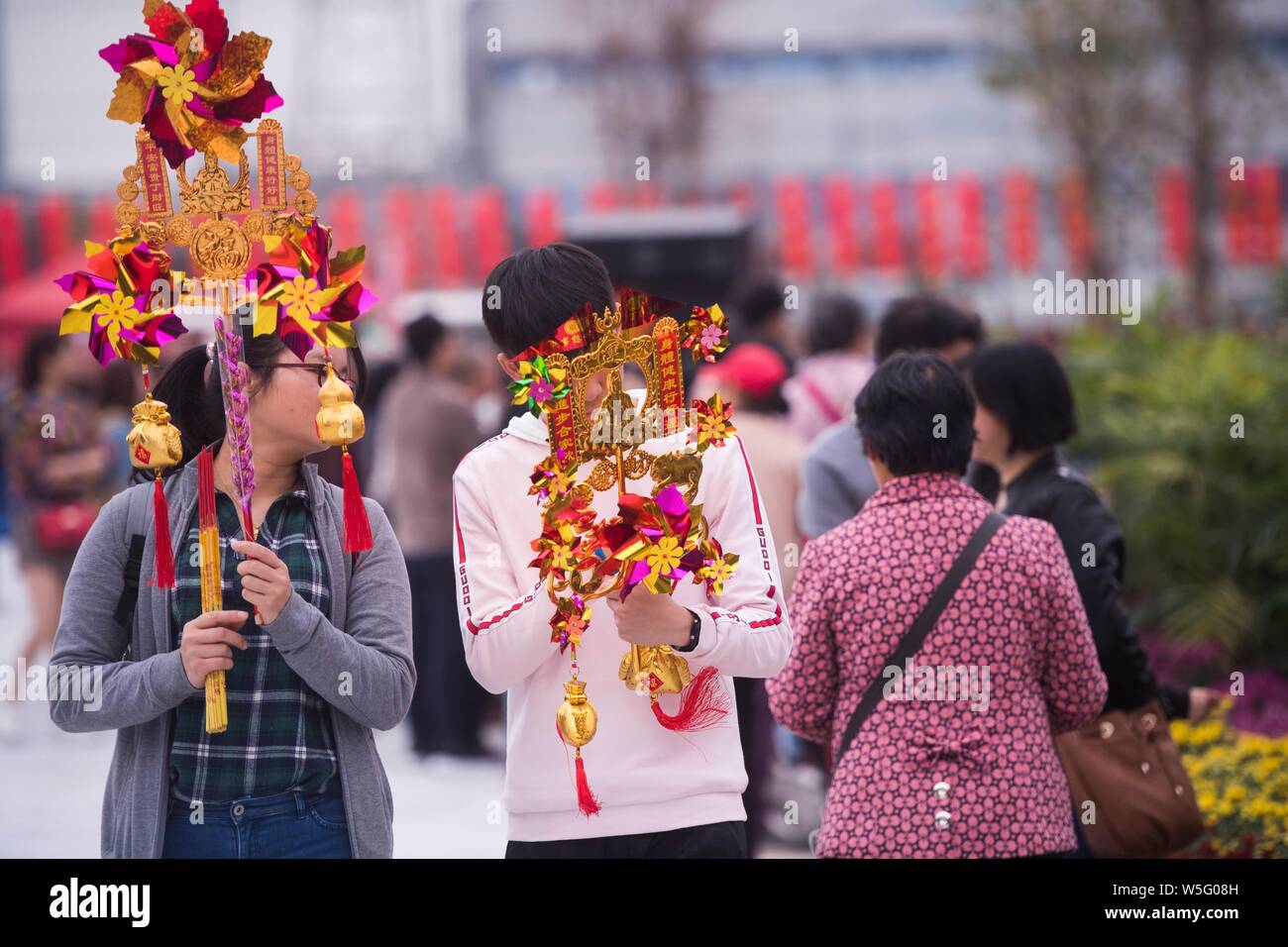 People attend the opening ceremony of the Boluo Dan Temple Fair ...