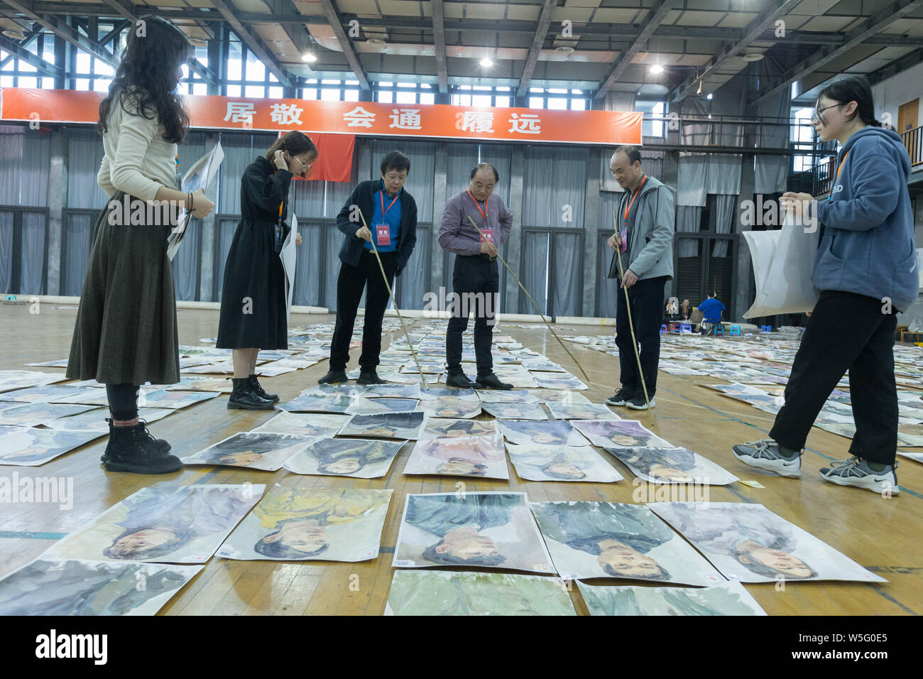 Teachers from China Academy of Art view the sketches completed by ...