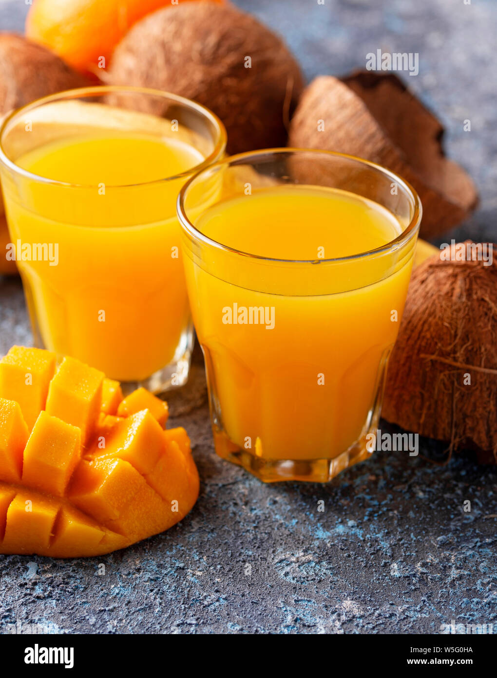 Fresh tropical mix fruit juice Stock Photo - Alamy