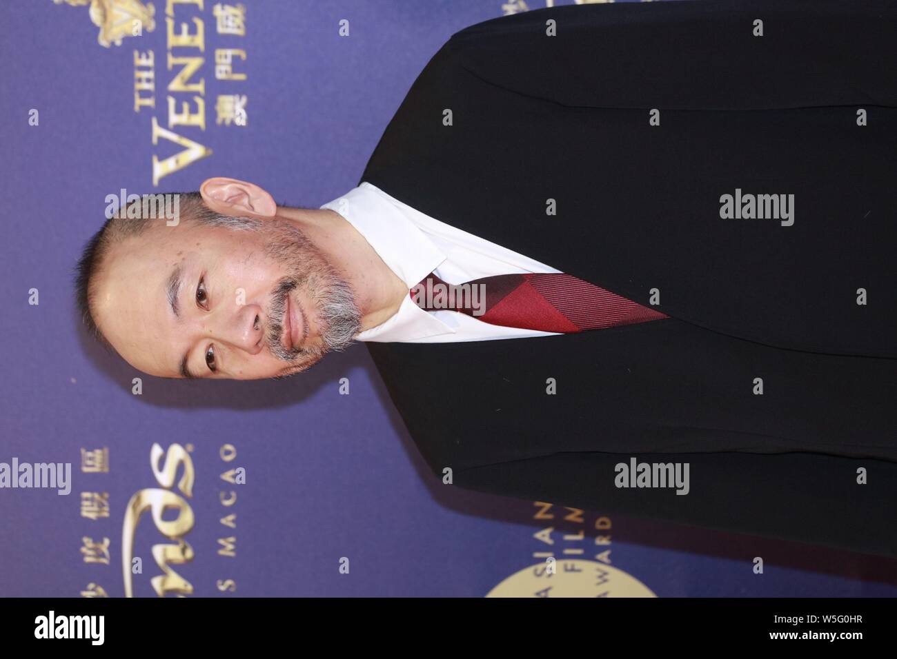 Japanese film director and actor Tsukamato Shinya poses as he arrives ...
