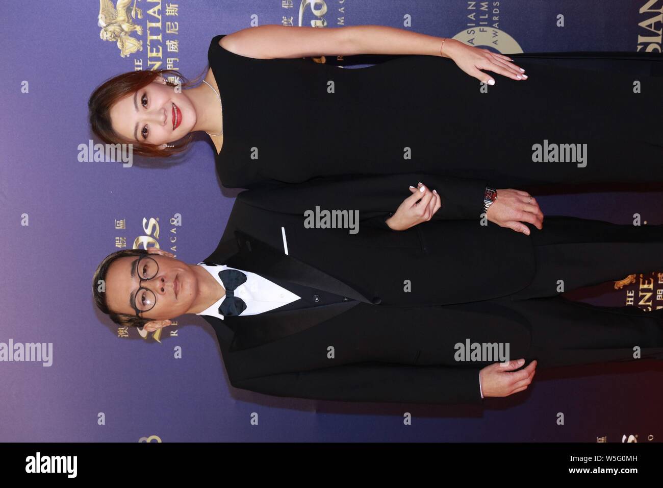 Hong Kong actor and singer Jordan Chan, left, and his actress wife ...