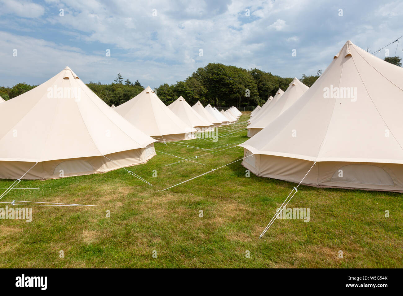 Large high end glamping tents, at an outdoor festival UK Stock Photo ...