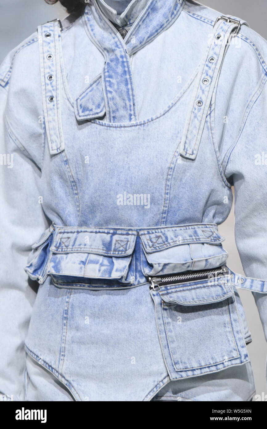 A model displays a new creation at the fashion show of Nomanoman by ...