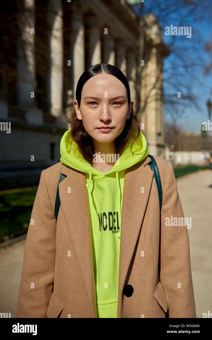 A trendy woman poses for street snaps during the Paris Fashion Week ...
