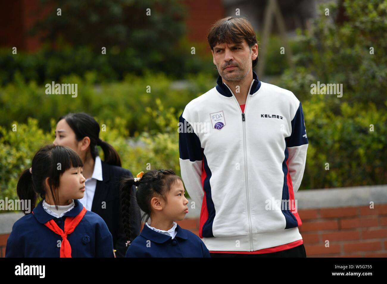 Spanish former football player Fernando Morientes plays football with ...