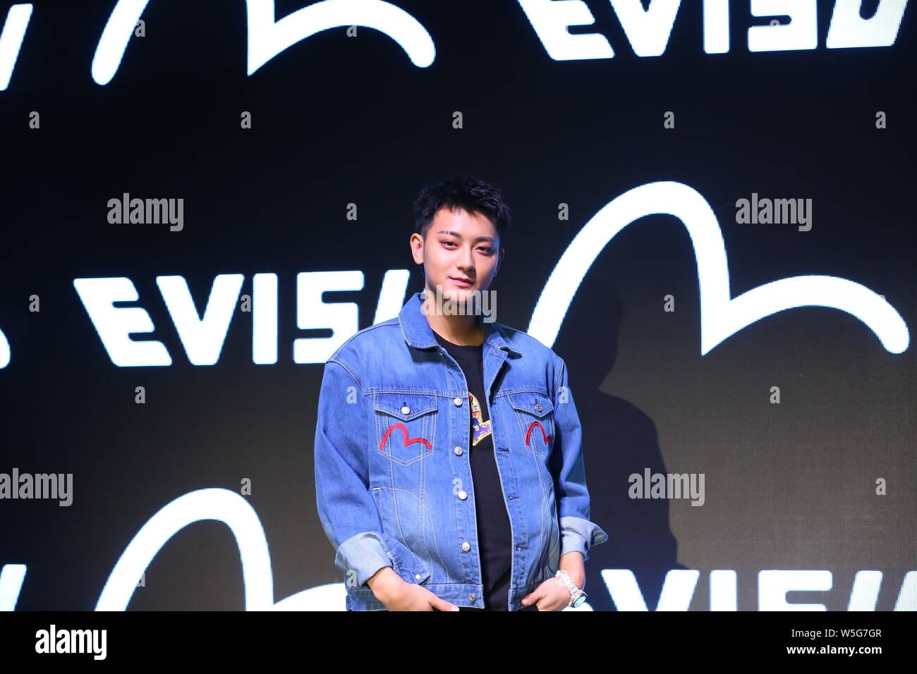 Chinese actor Huang Zitao, better known as Z.Tao, attends a promotional event by EVISU's fashion ...