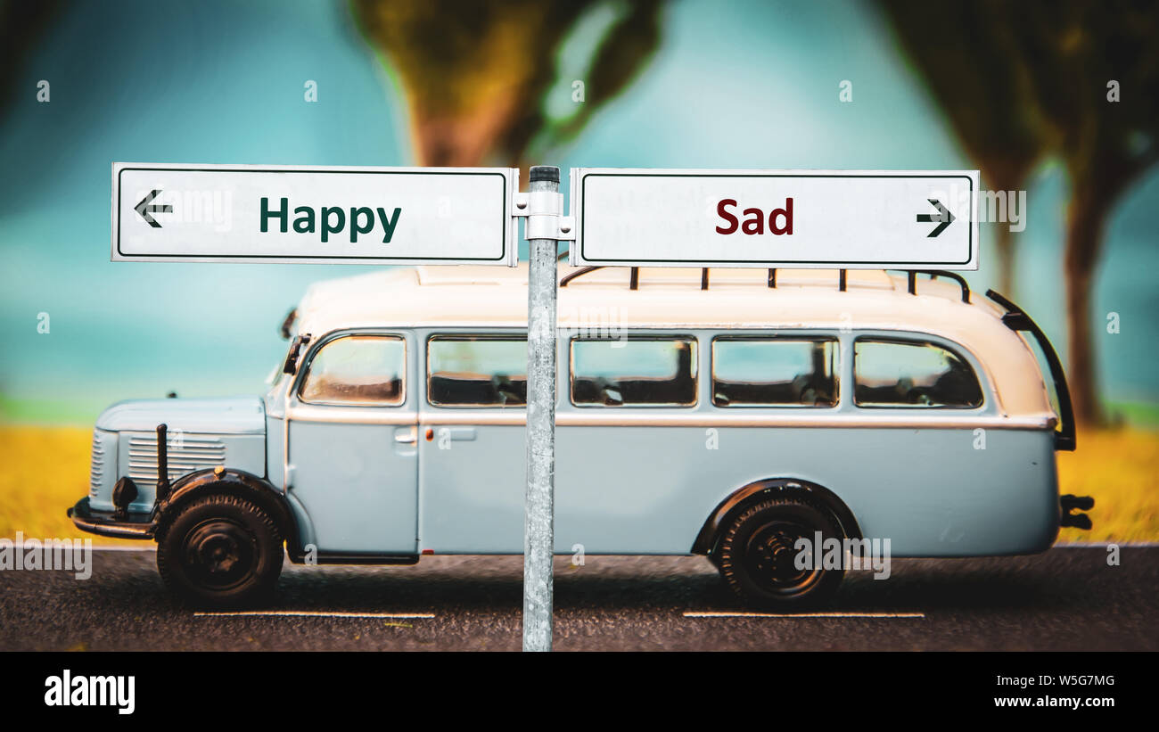 Street Sign the Direction Way to Happy versus Sad Stock Photo - Alamy