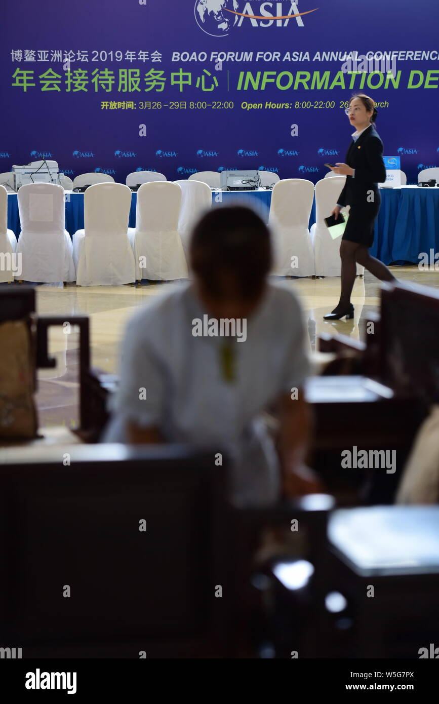 A Chinese worker prepares at the BFA International Convention Center ...