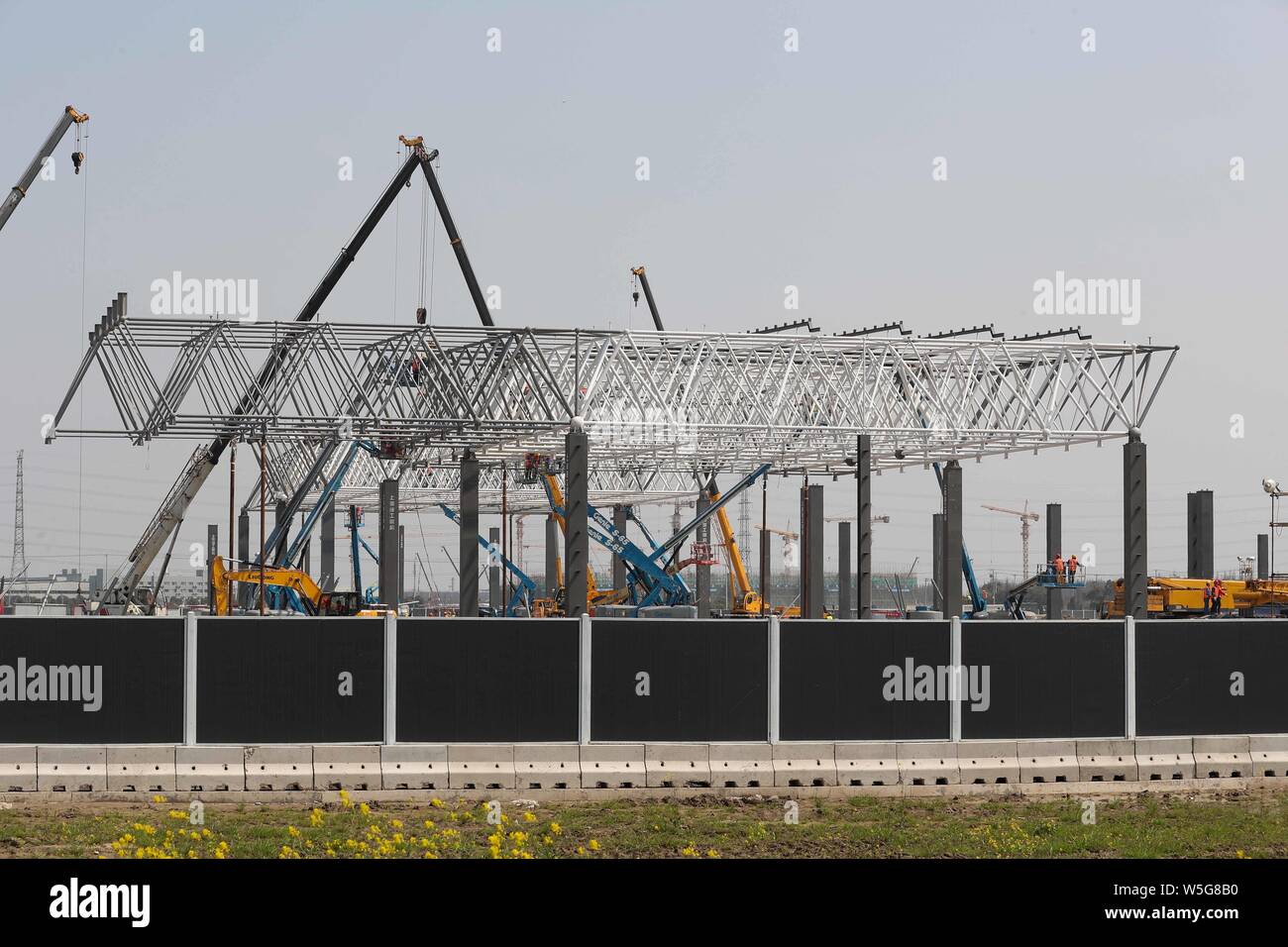 The Tesla Shanghai Gigafactory is under construction in Lingang ...