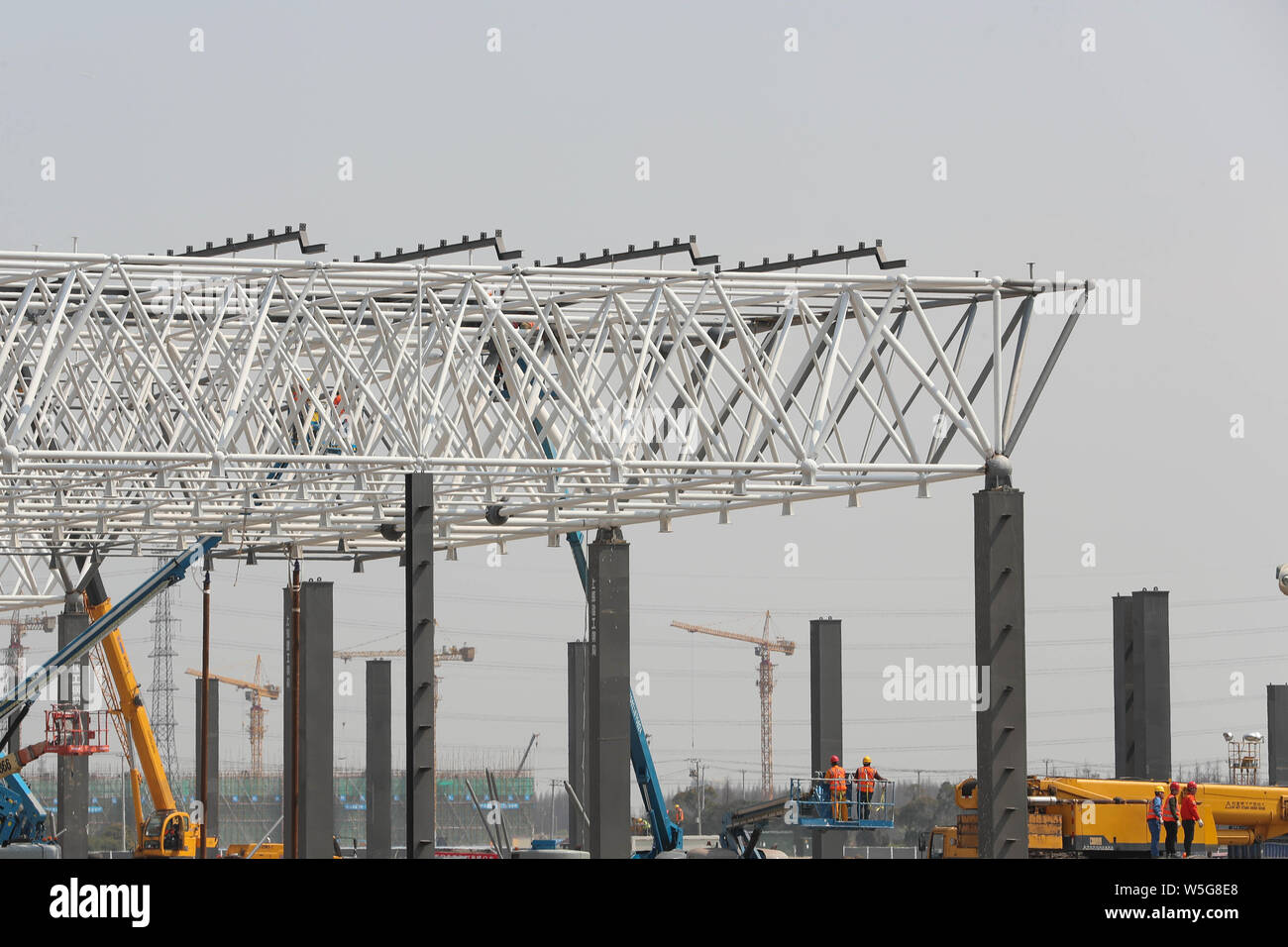 The Tesla Shanghai Gigafactory is under construction in Lingang ...