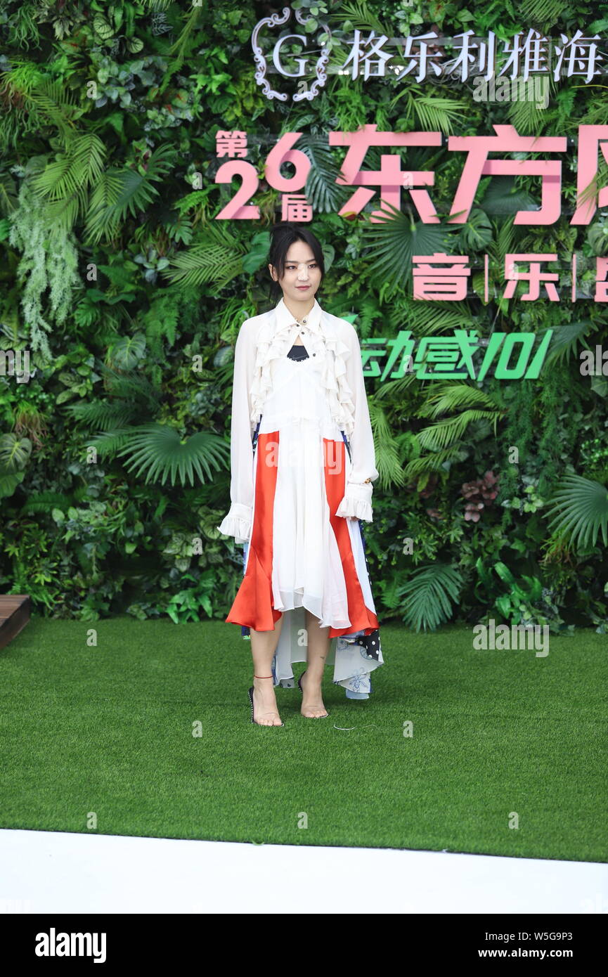 Chinese singer Zhou Bichang, also known as Bibi Zhou, poses as she ...