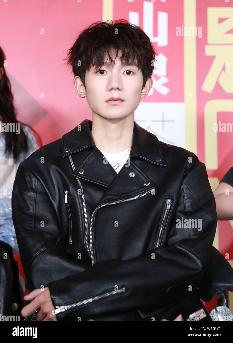 Roy Wang or Wang Yuan of Chinese boy group TFBoys poses during a filming session of the reality ...