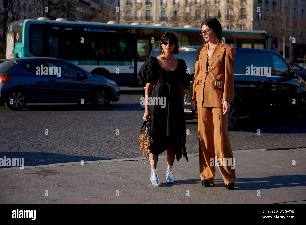 A trendy woman poses for street snaps during the Paris Fashion Week ...